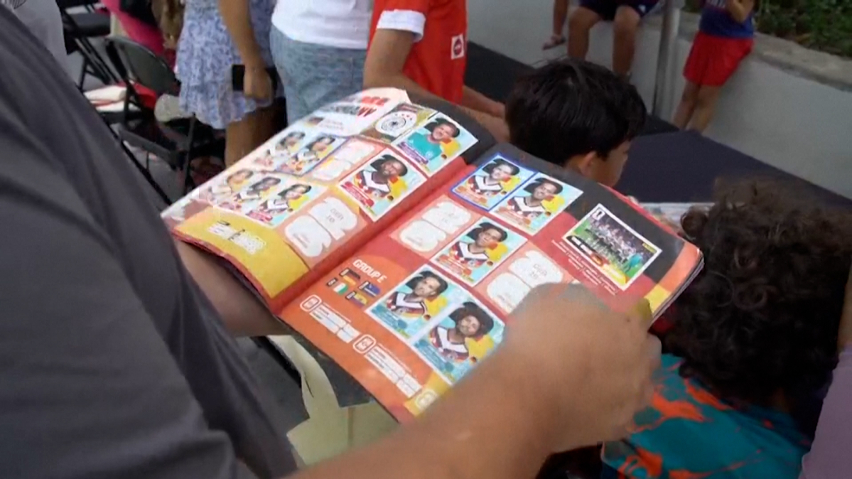Miami fans trade stickers before World Cup | AnewZ